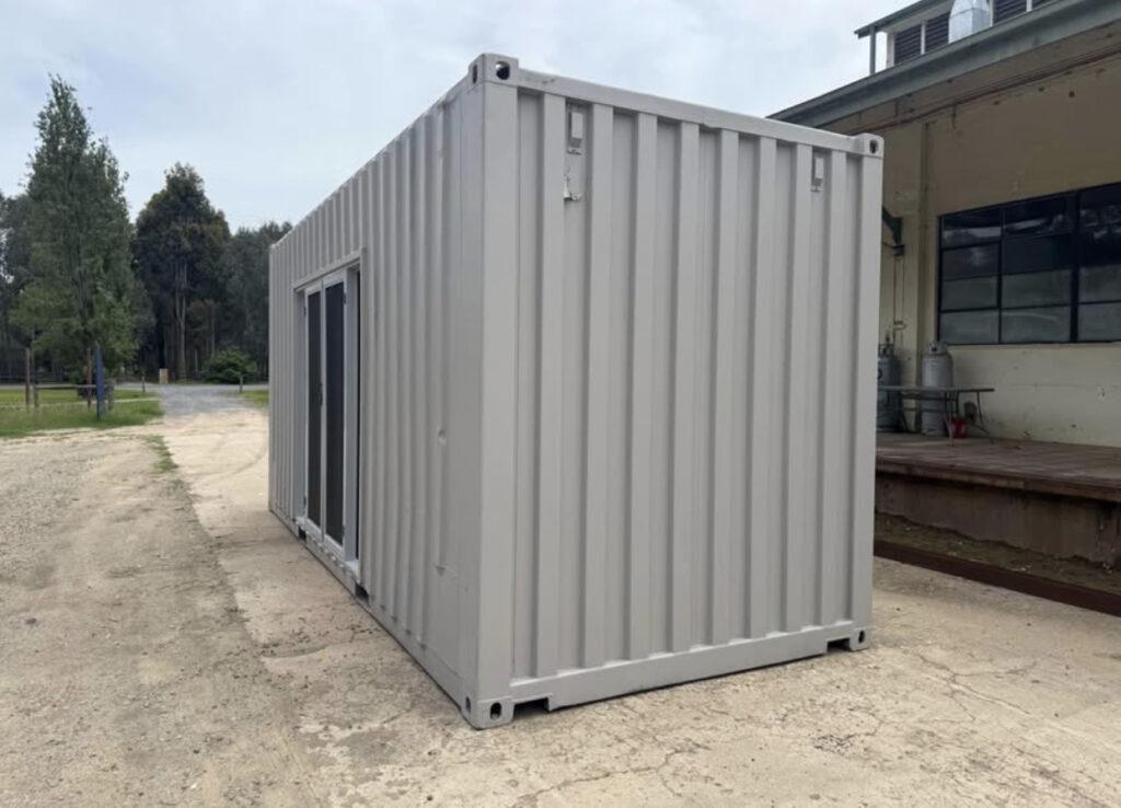 OFICINA CONTENEDOR 20' PIES HIGH TOP CON PUERTA COMERCIAL